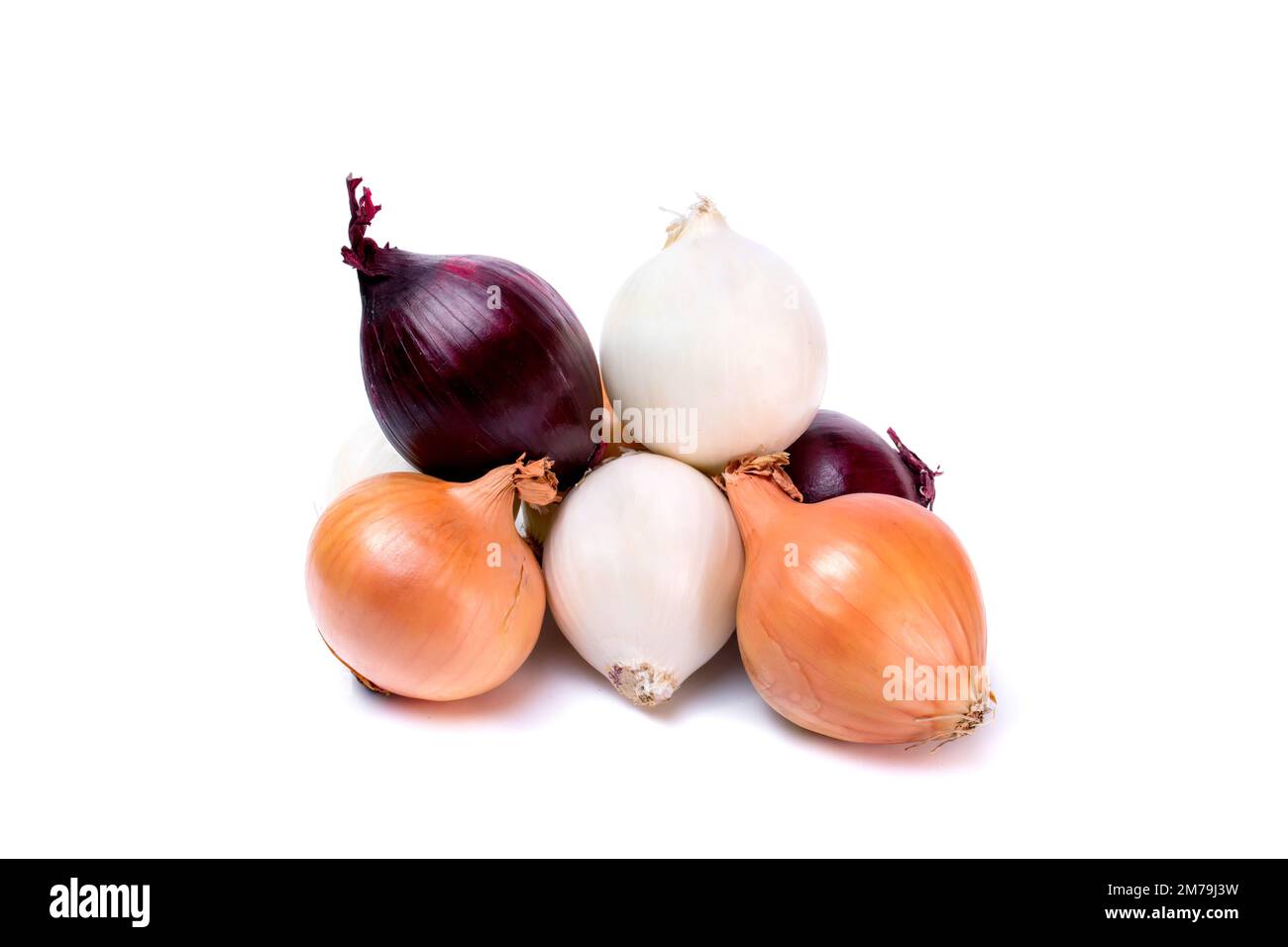 Different varieties of onions, red, white, golden isolated on a white ...