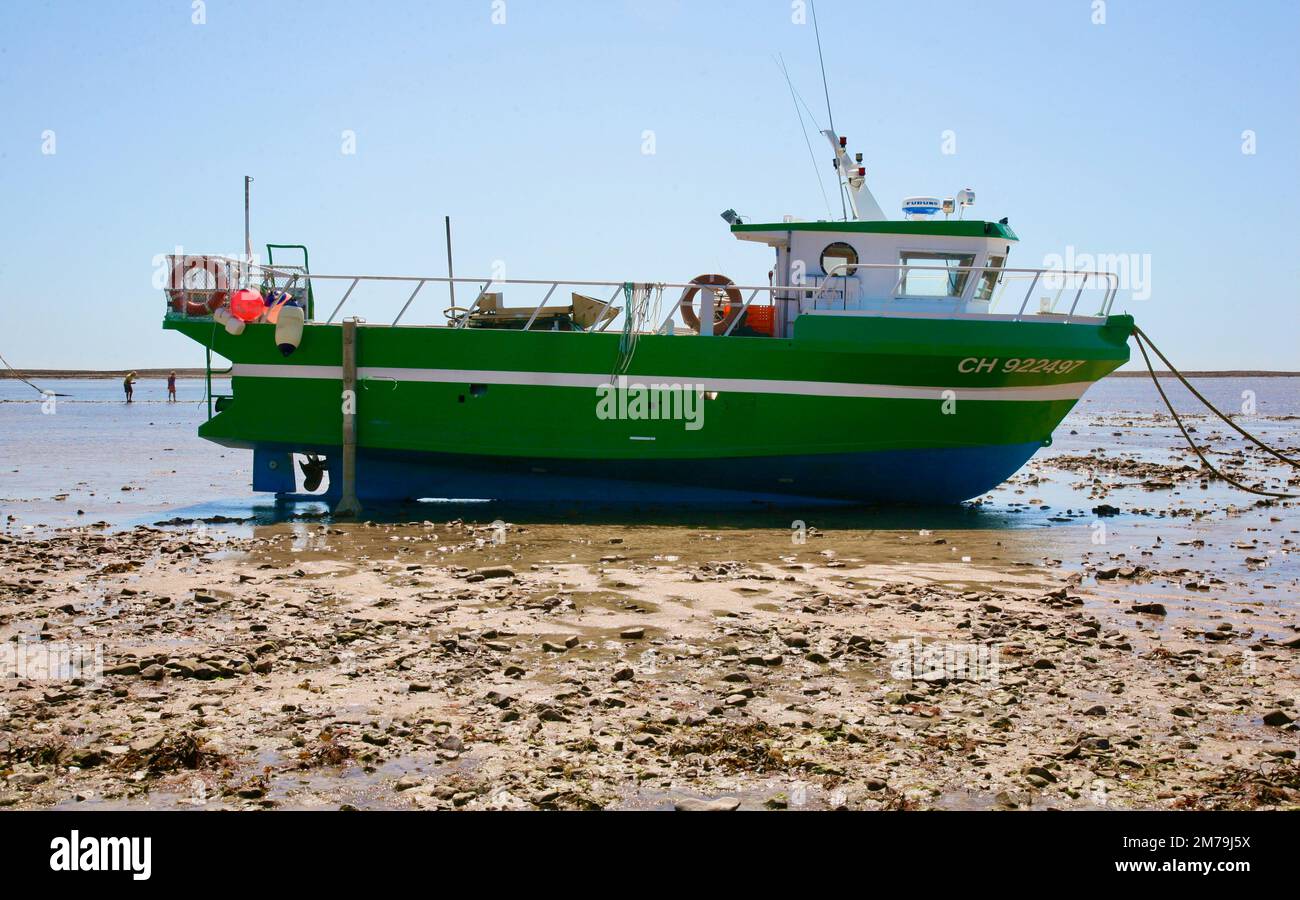 A fishing boat at Pirou Plage on the Cherbourg Peninsula, Normandy ...