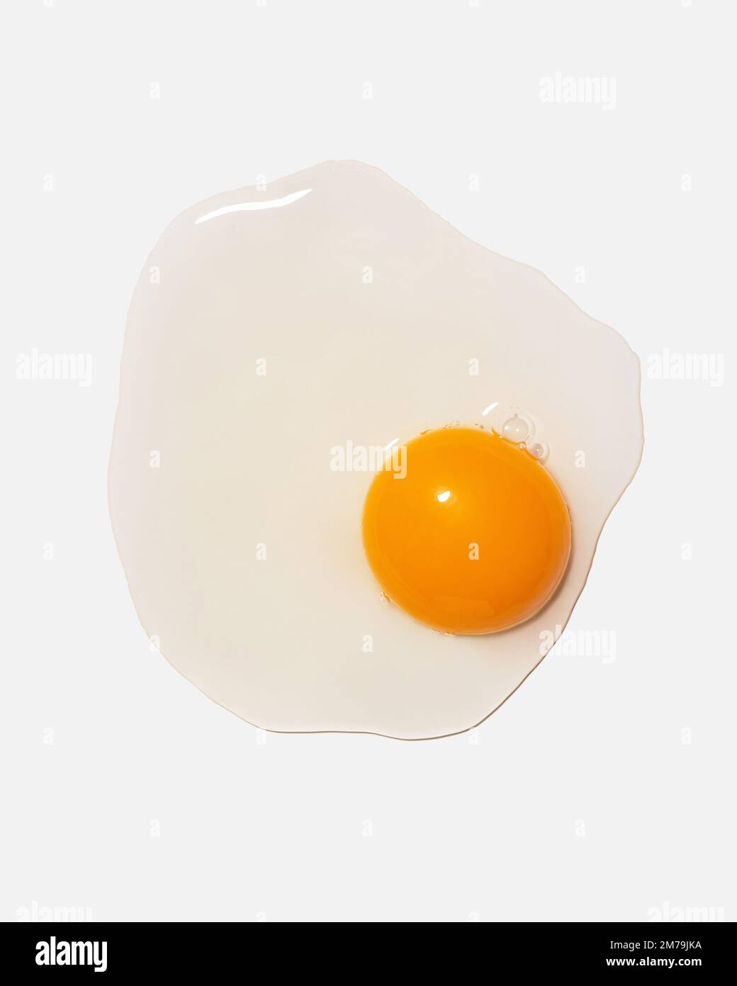 Raw egg isolated on white background Stock Photo - Alamy