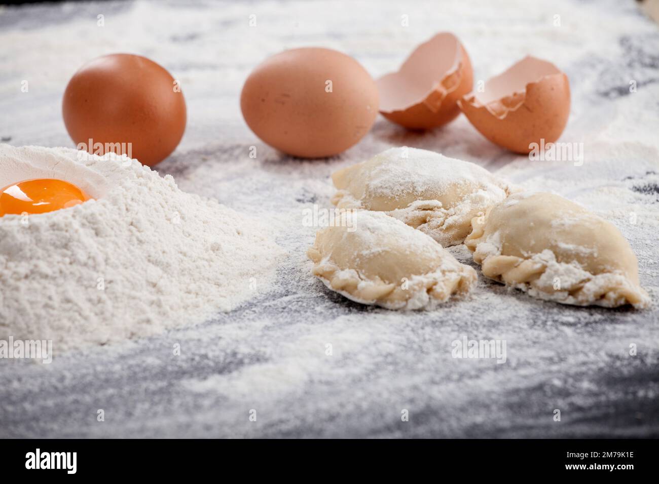 Traditional Polish dumplings. Homemade dumplings production Stock Photo ...