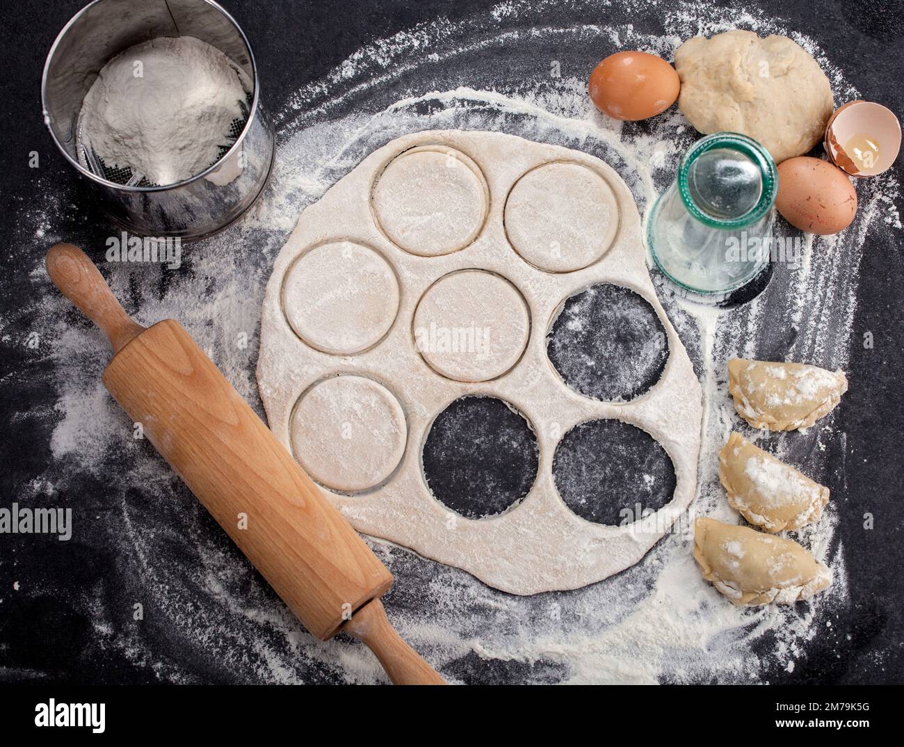 Traditional Polish dumplings. Homemade dumplings production Stock Photo ...