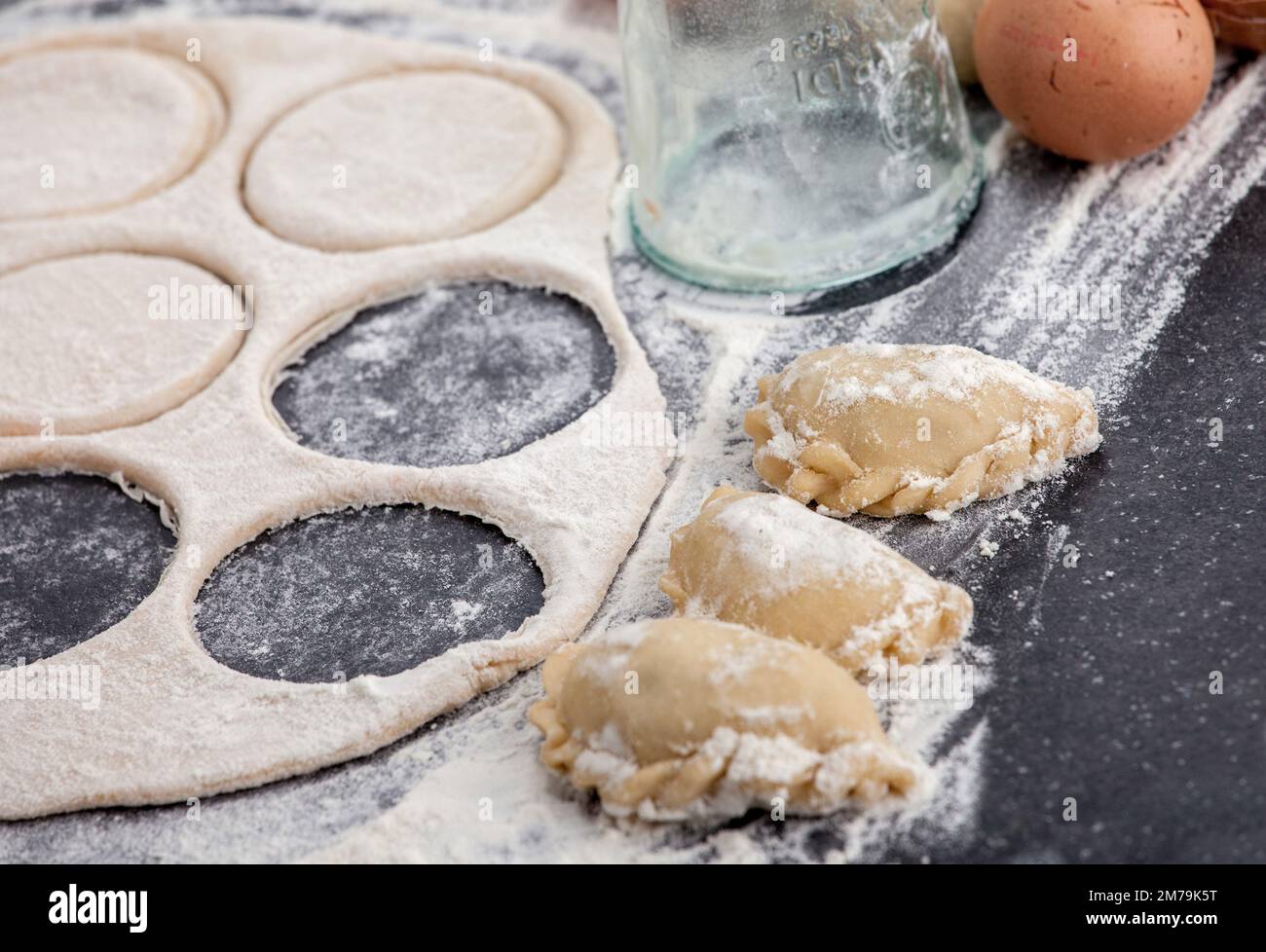 Traditional Polish dumplings. Homemade dumplings production Stock Photo ...