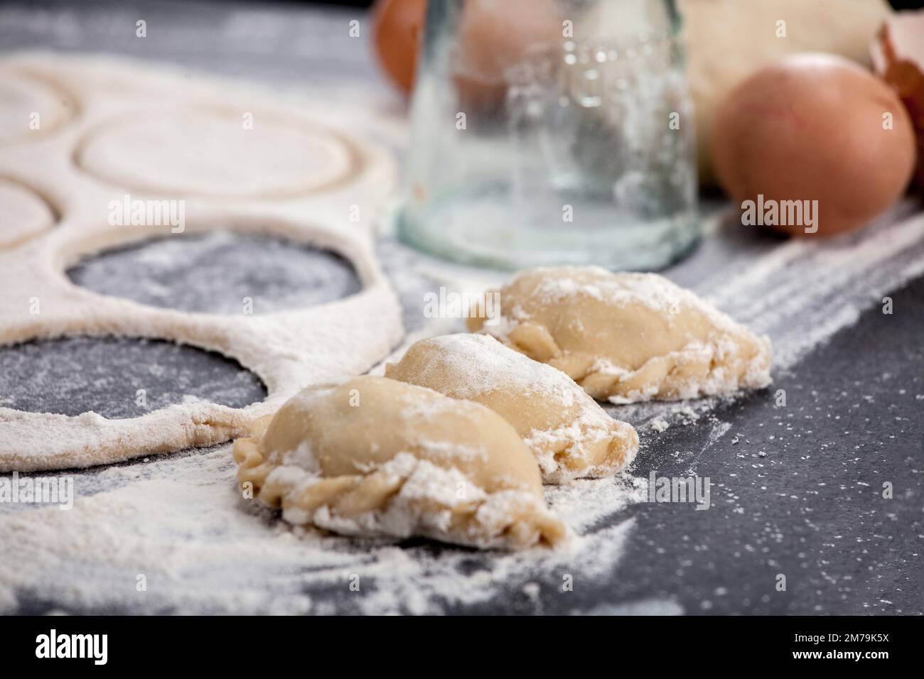 Traditional Polish dumplings. Homemade dumplings production Stock Photo ...