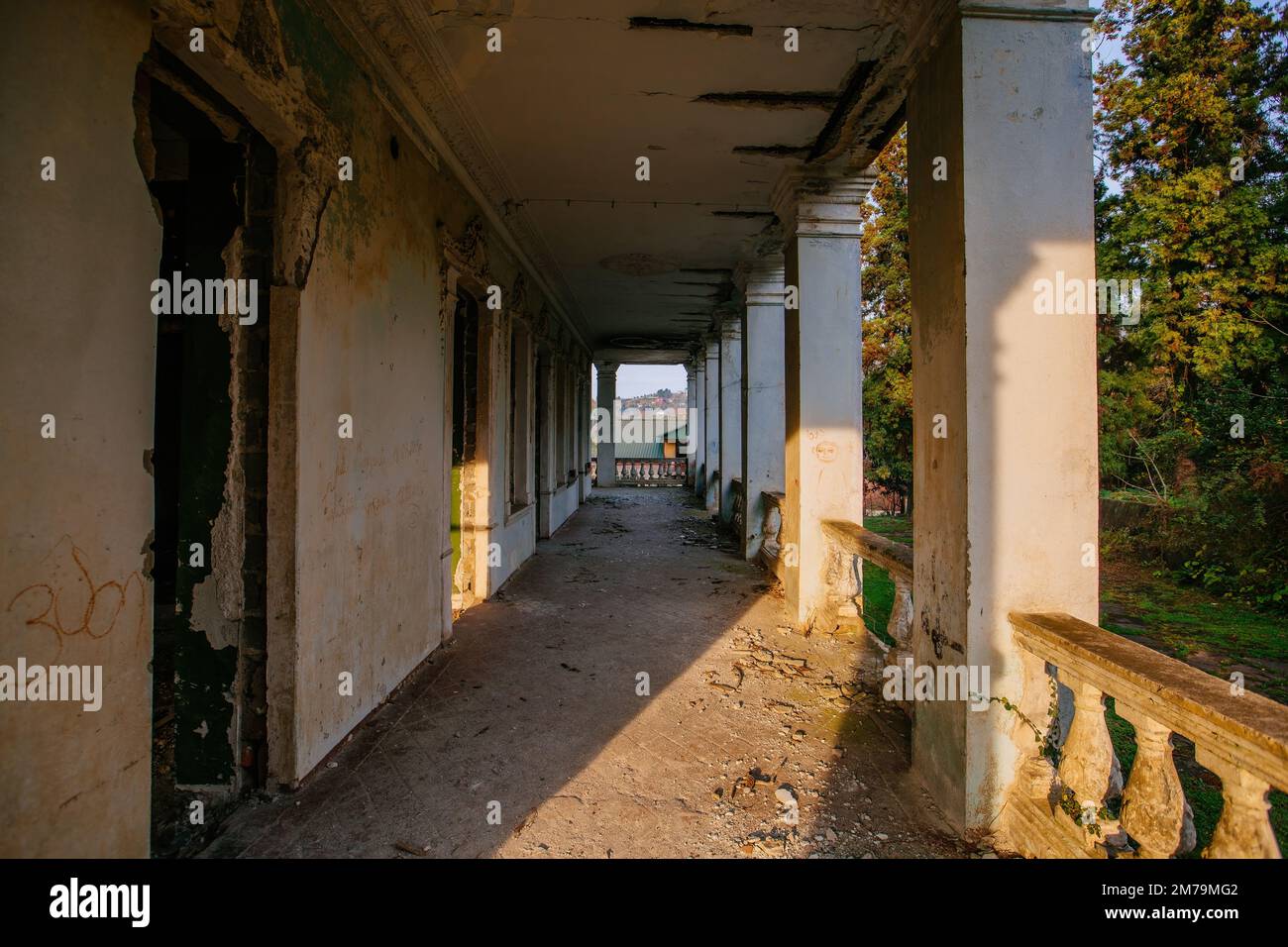 Old colonnade in an abandoned mansion Stock Photo - Alamy