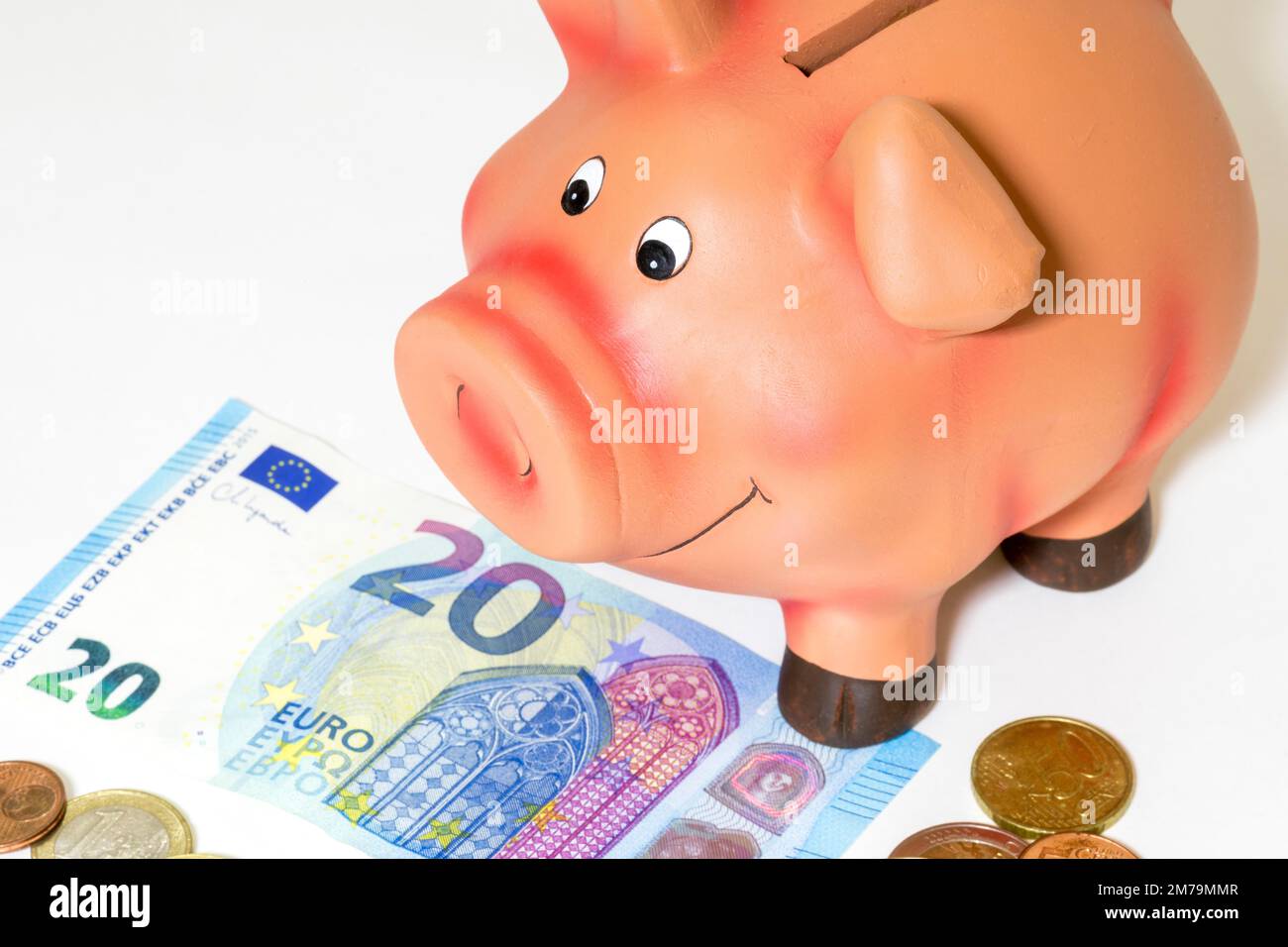 Pink piggy bank with euro note and coins, 20 Euro, cent, detail, studio ...