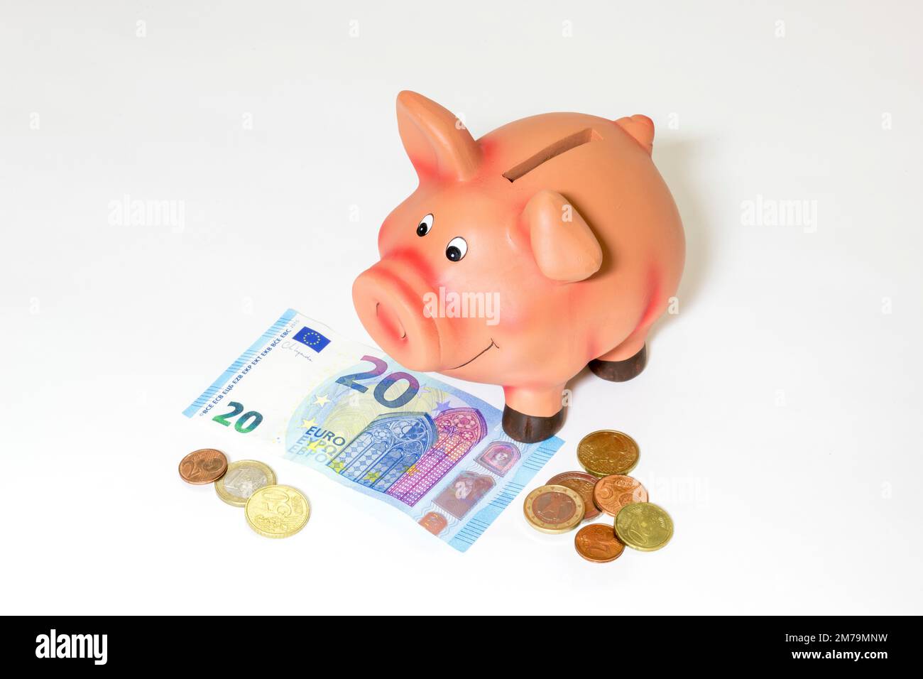 Pink piggy bank with euro note and coins, 20 Euro, cent, studio ...