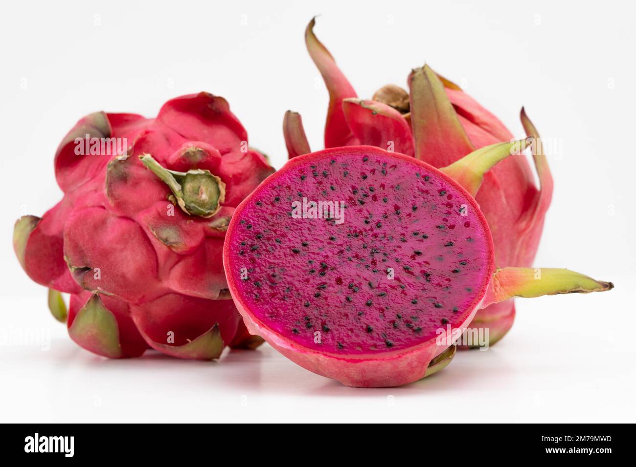 Pink pitahaya or dragon fruit isolated on white background with copy ...