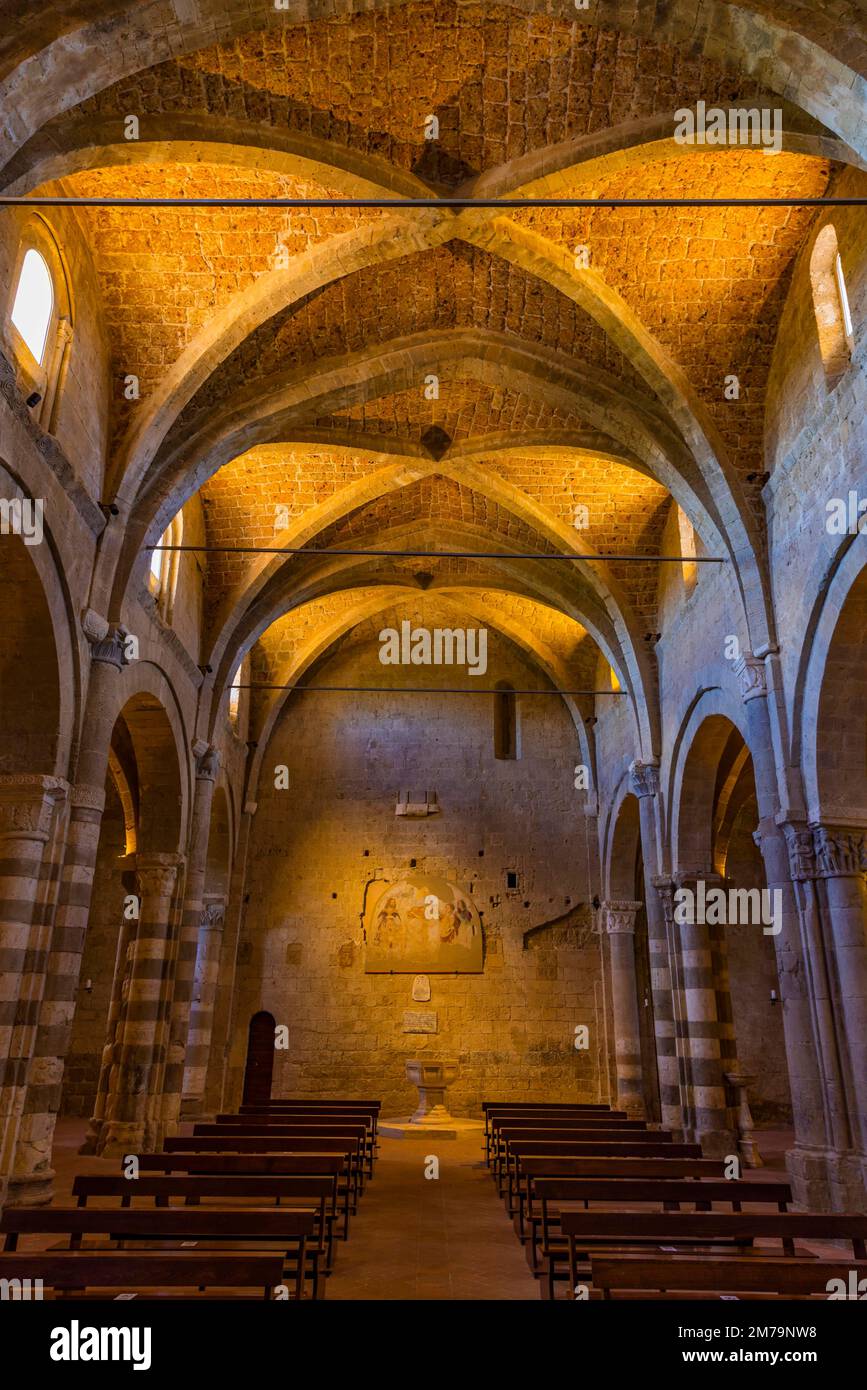 The illuminated ceiling vault of Sovana Cathedral, view towards the ...