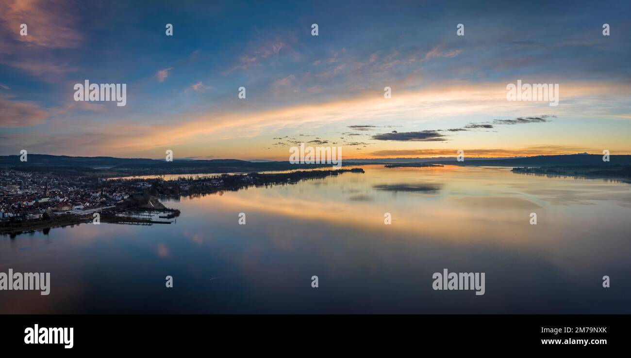 Aerial view of western Lake Constance in front of sunrise, with the ...