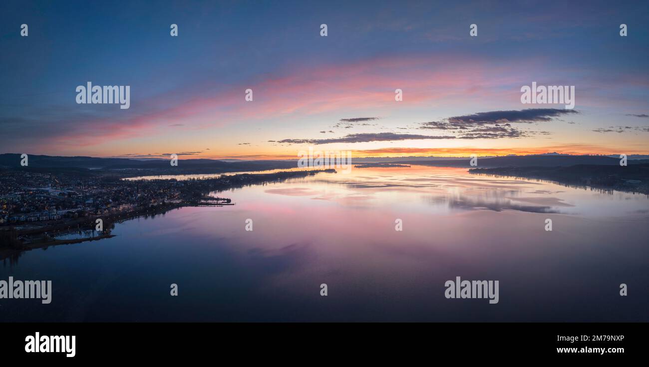 Aerial view of western Lake Constance in front of sunrise, with the ...