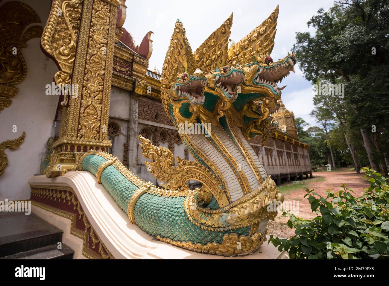 Dragon heads at the entrance of the temple complex Sri Chai Mongkol ...