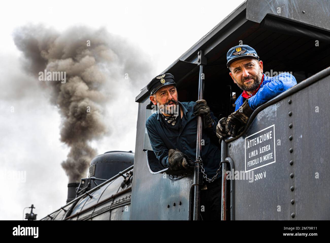 Stoker of the historic steam locomotive, Treno Natura, Val dOrcia ...