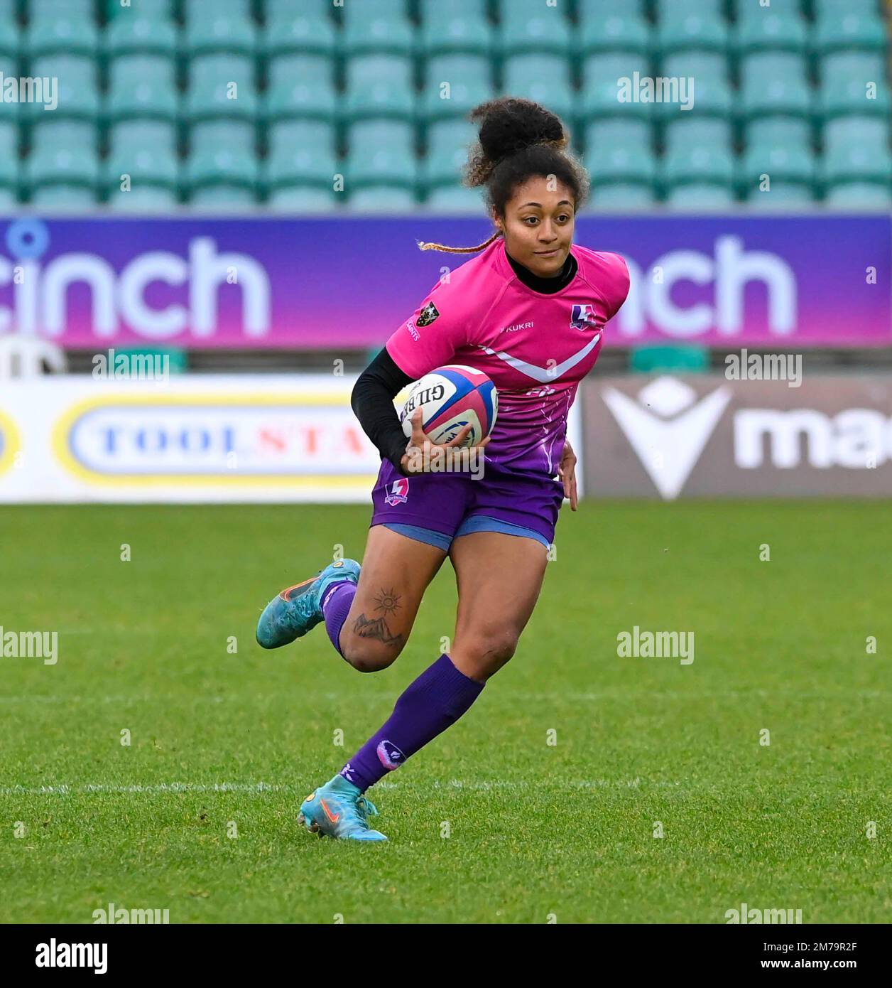 NORTHAMPTON, ENGLAND : Bulou Mataitoga of Loughborough Lightning runs ...