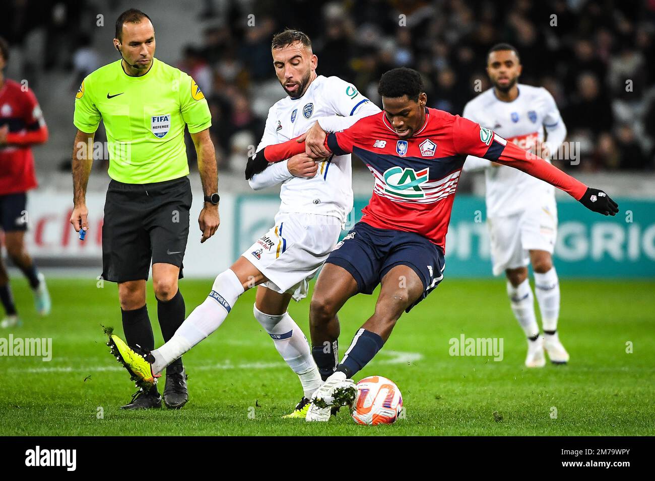 Florian TARDIEU of ESTAC Troyes and Jonathan DAVID of Lille during the ...