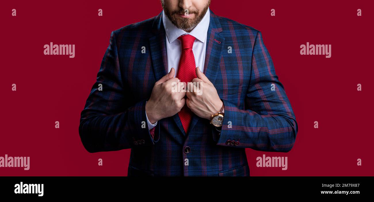 cropped view of business man in formalwear isolated on red background ...