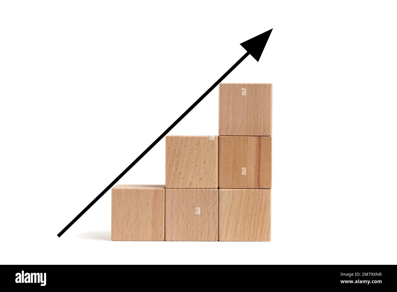 Wooden cubes are built form stair and arrows rising top.Concept growth ...
