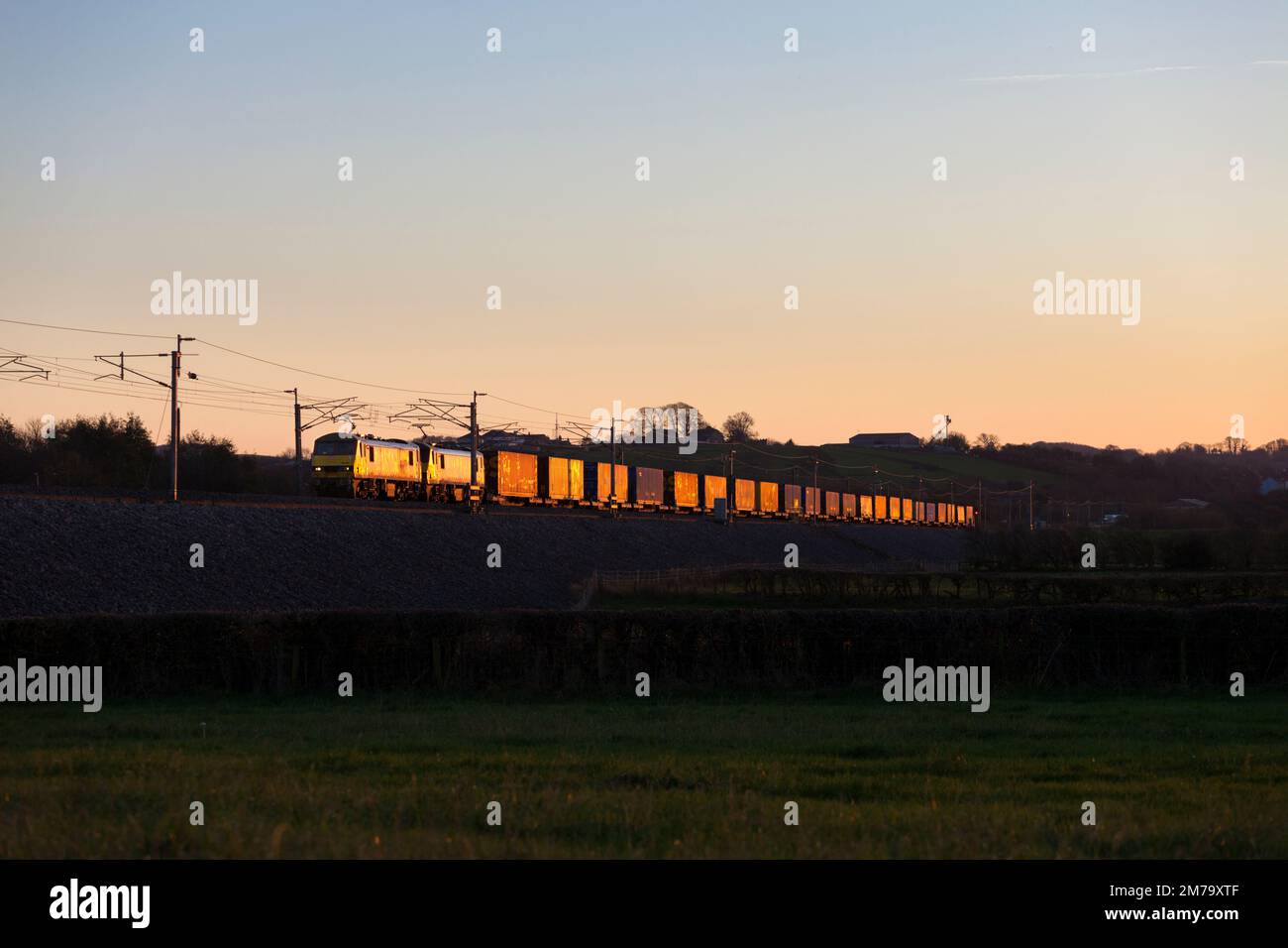 2 DB cargo Rail UK class 90 electric locomotives hauling a intermodal ...