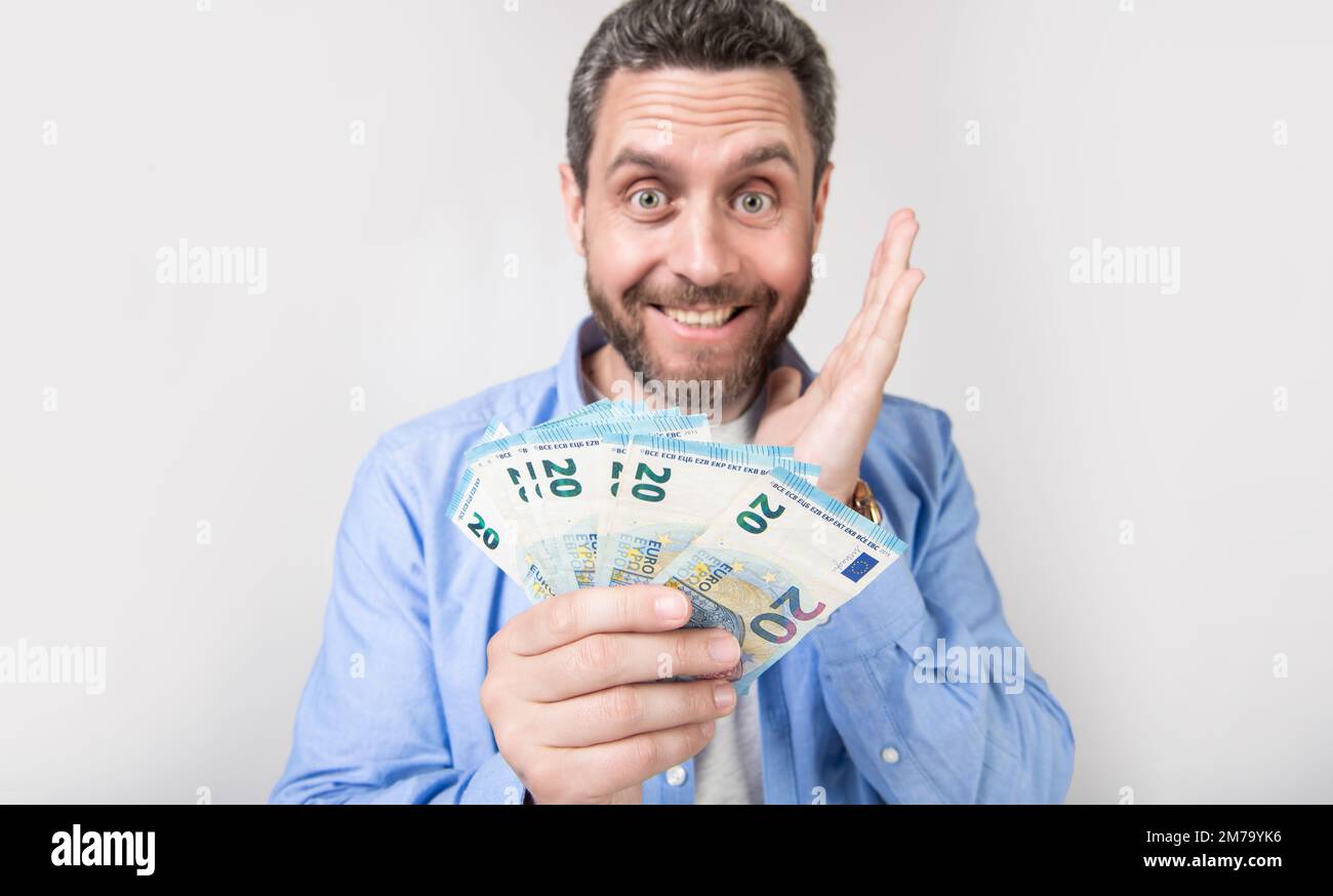 photo of glad man with cash money. man with cash money isolated on ...