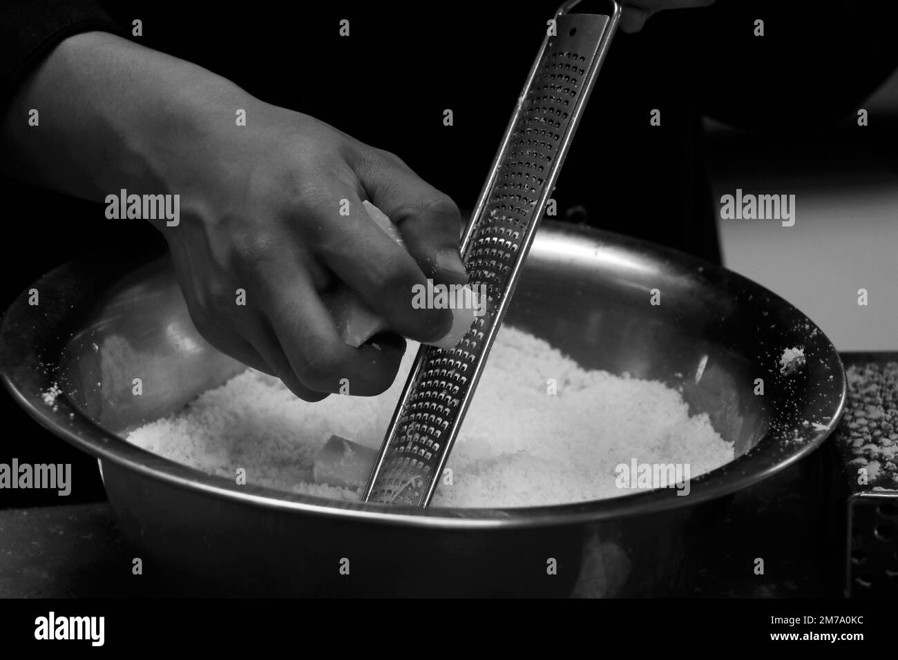 Grated cheese parmesan Black and White Stock Photos & Images - Alamy