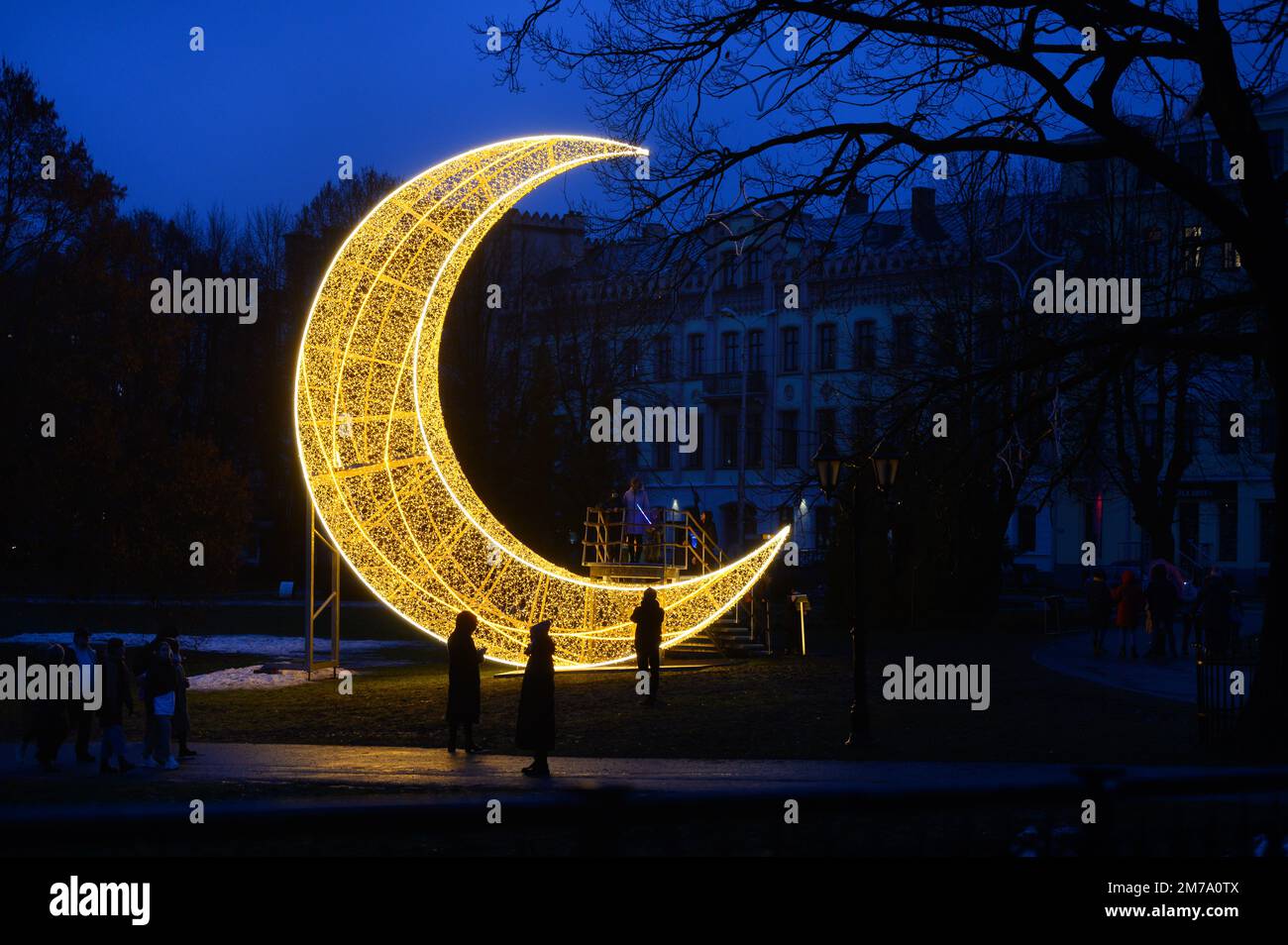 Riga, Latvia, January 1, 2023: Moon shape lighting installation in the ...