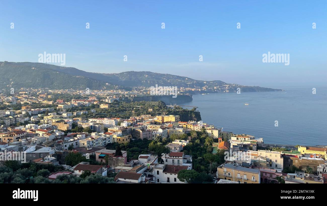 A beautiful view of an old town with small houses and a sea under the ...