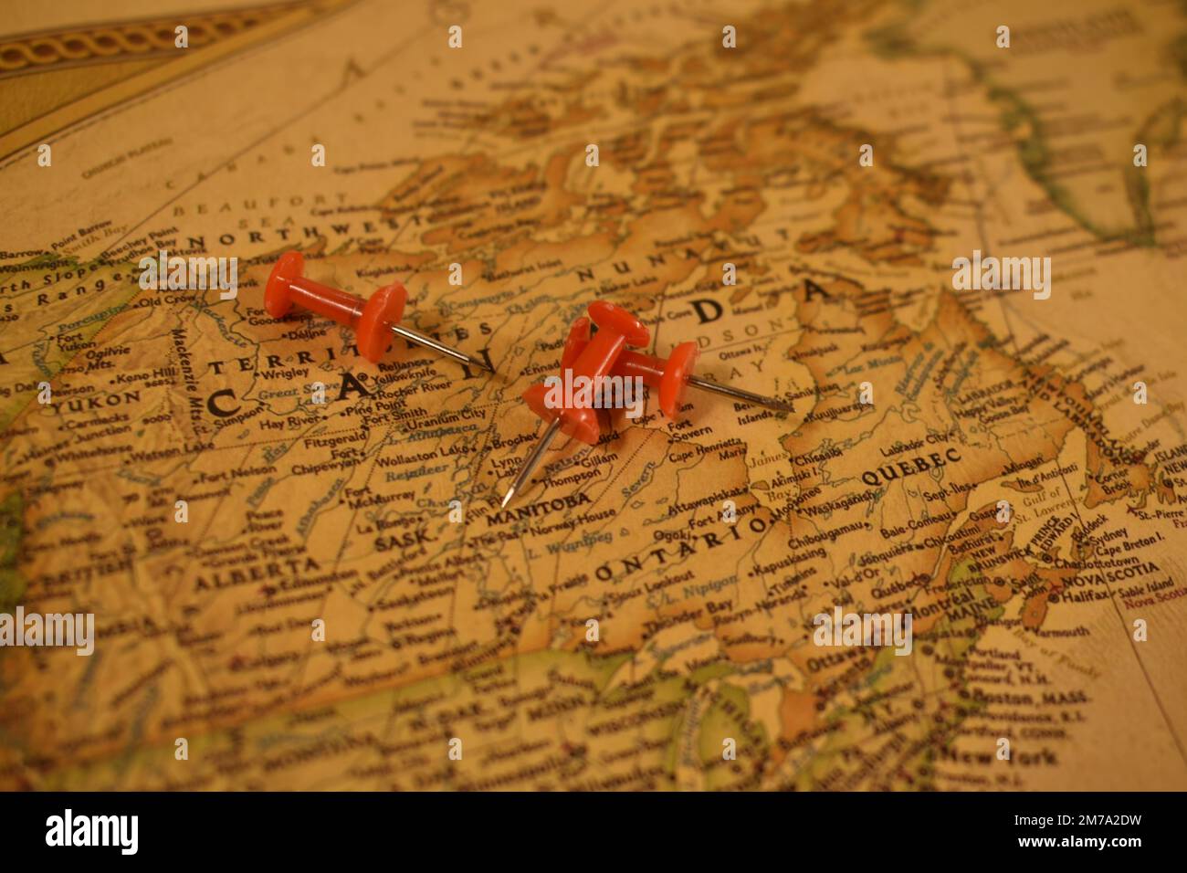Vintage map of Canada with a three pins on a map Stock Photo - Alamy