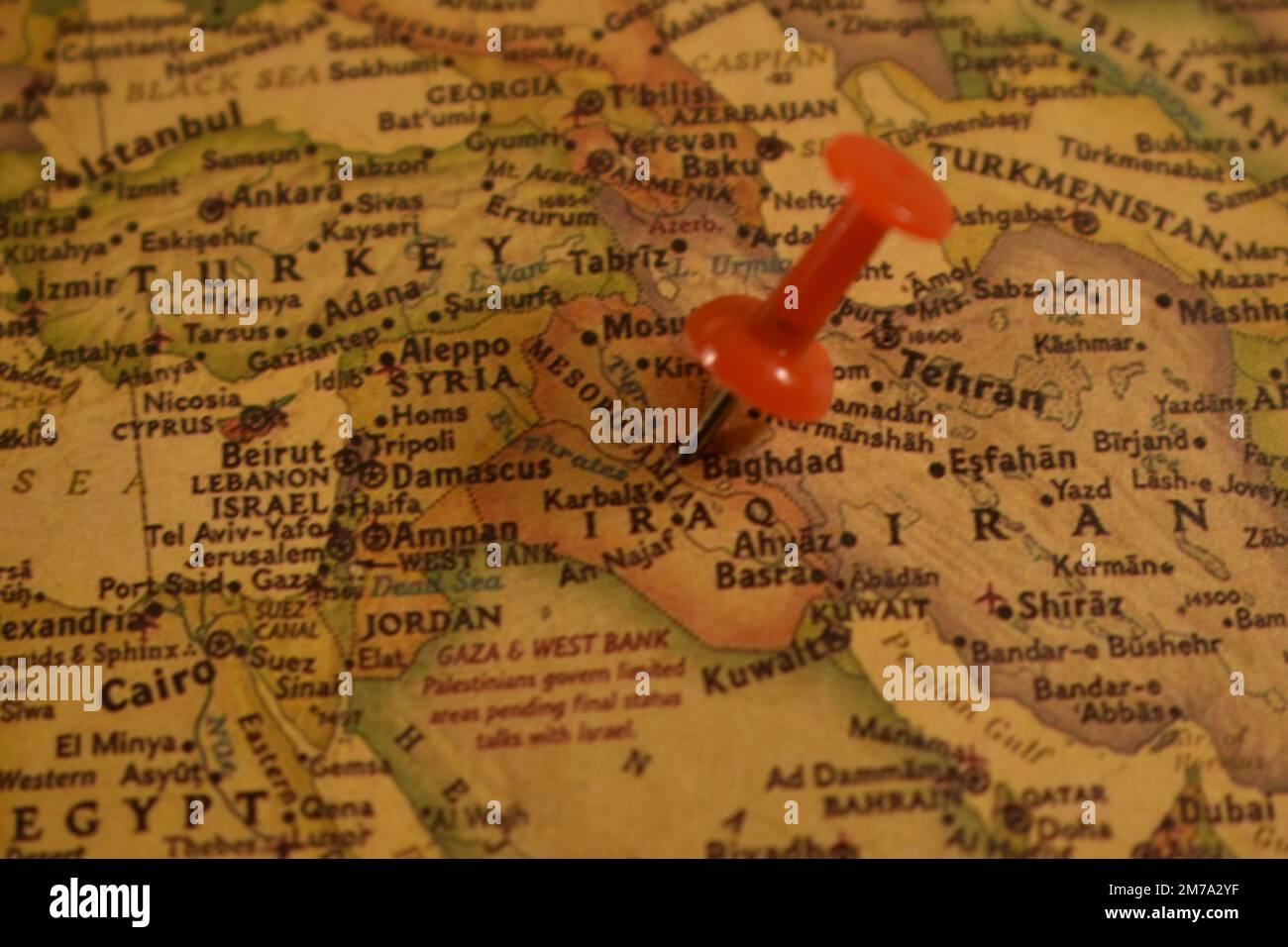 Vintage map of Iraq with a pin on a Baghdad Stock Photo - Alamy