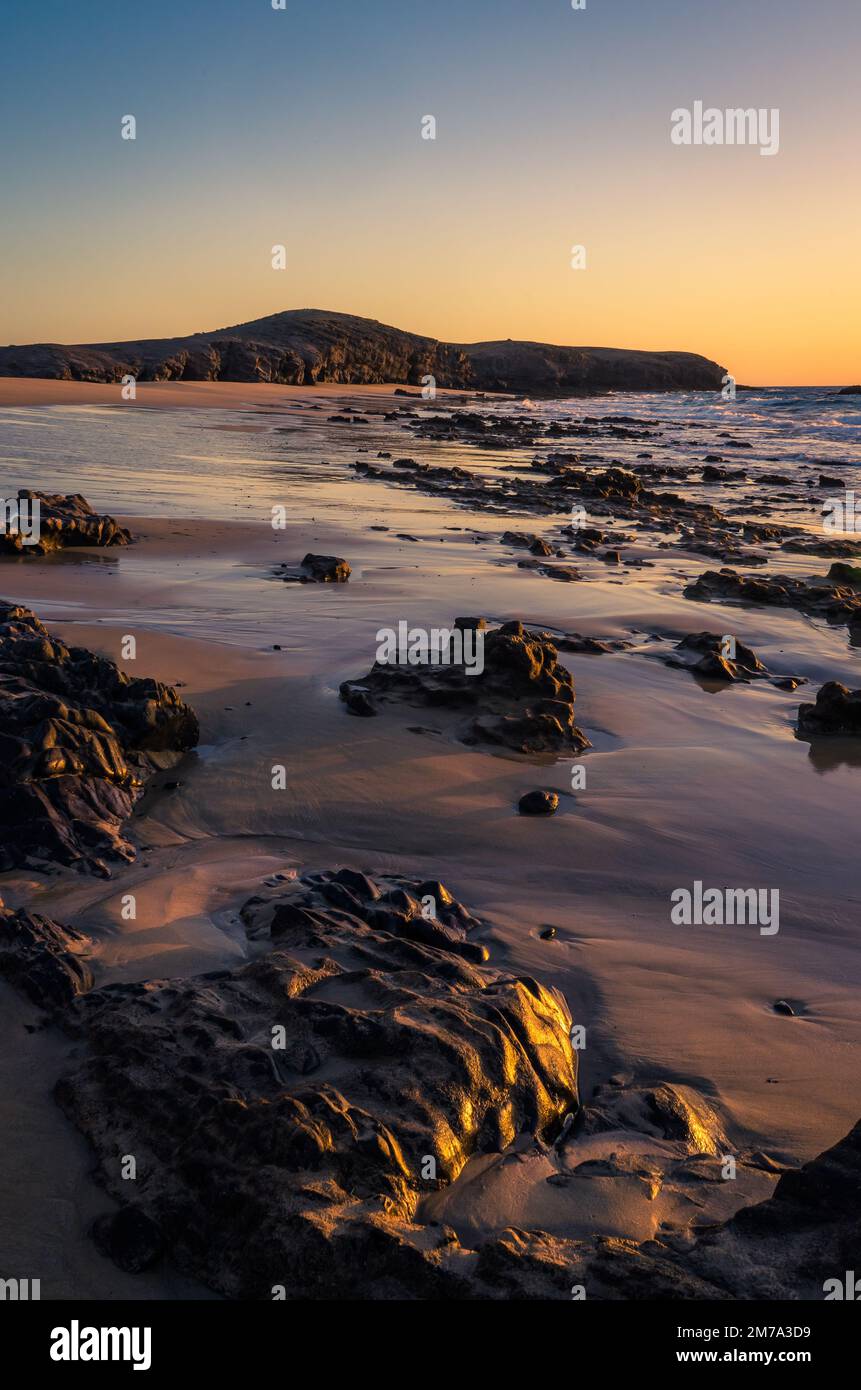 Rock formations along the beach at Playa Caleta del Congrio in the ...