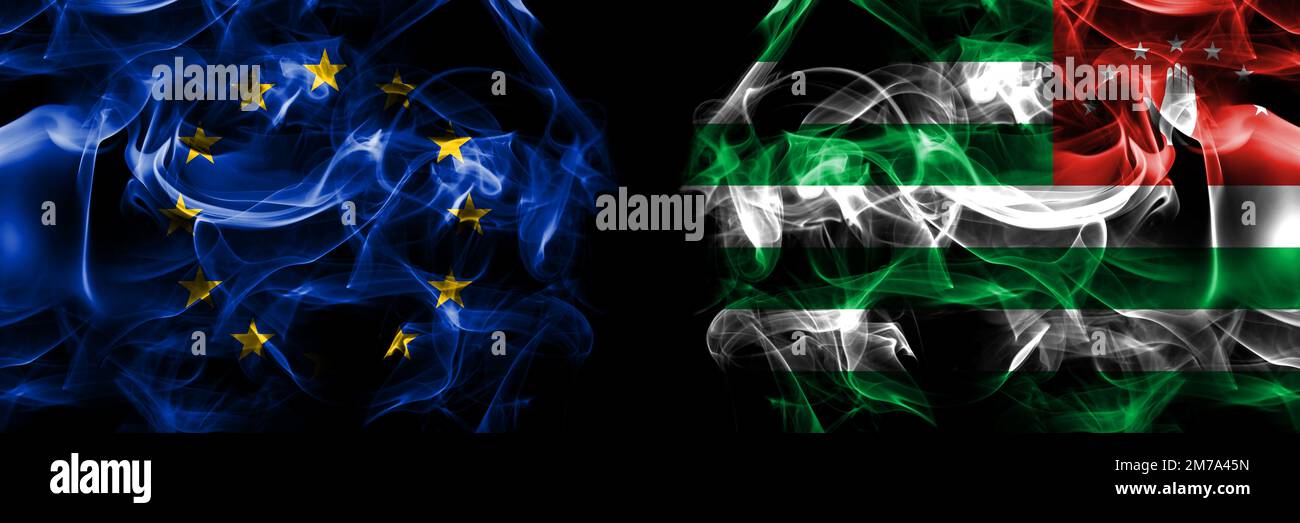 Flags of EU, European Union vs Abkhazia, Abkhazian. Smoke flag placed ...