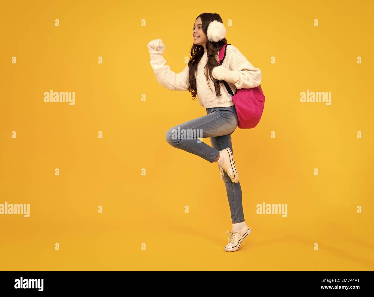 Autumn school. Teenager school girl with backpack in autumn clothes on ...