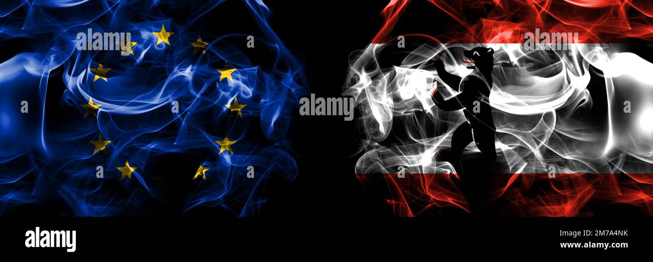 Flags of EU, European Union vs Germany, Berlin, city. Smoke flag placed ...