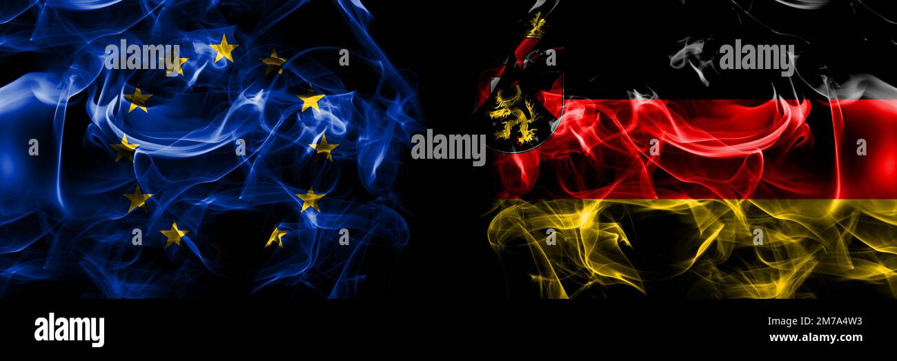 Flags of EU, European Union vs Germany, Rhineland, Palatinate. Smoke ...
