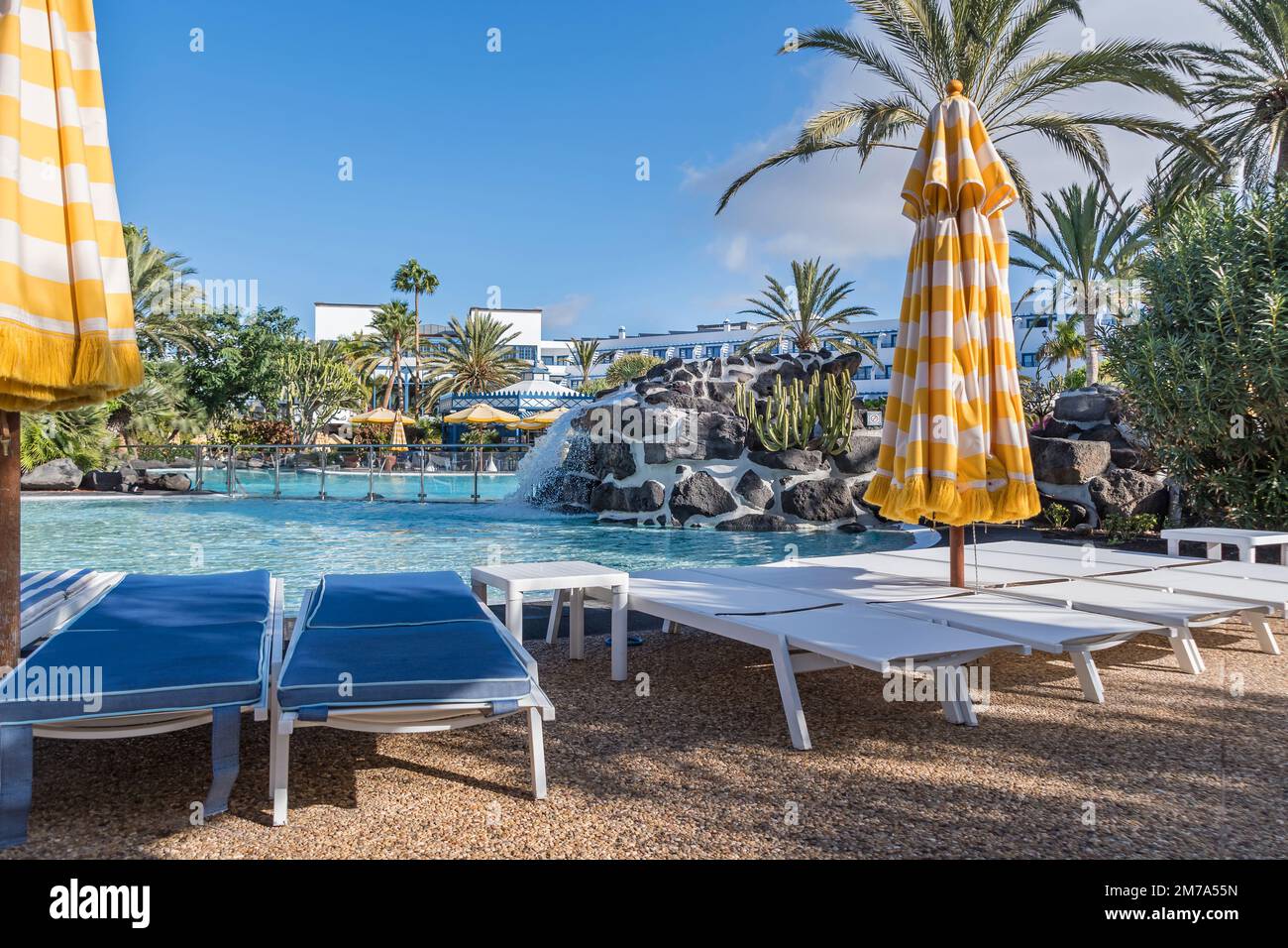 Puerto del Carmen, Spain - November 28, 2022: Pool landscape with sun ...