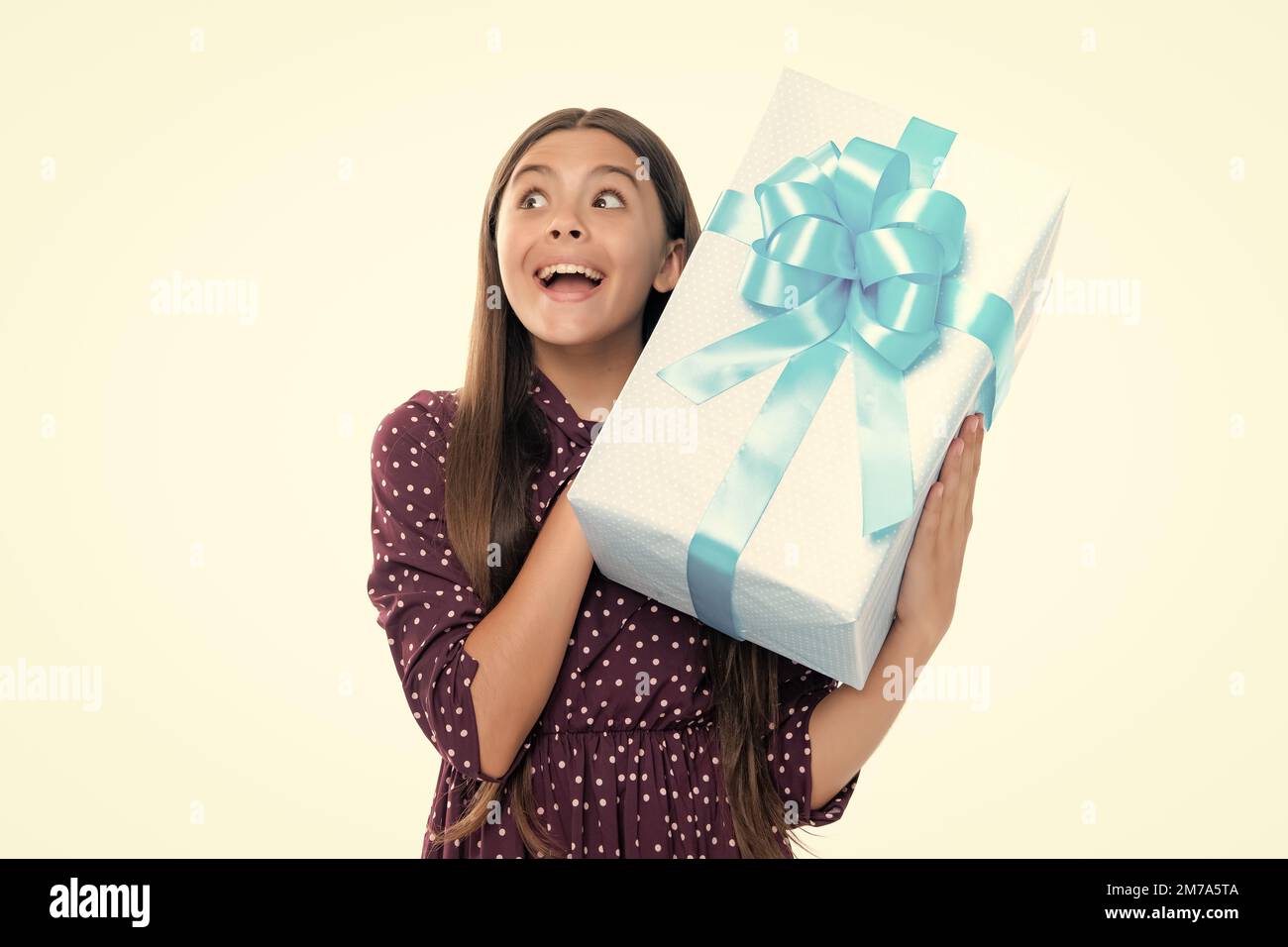 Teenager kid with present box. Teen girl giving birthday gift. Present ...