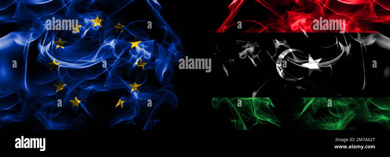 Flags of EU, European Union vs Libya, Libyan. Smoke flag placed side by ...