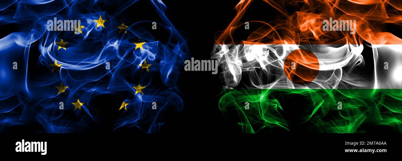 Flags of EU, European Union vs Niger, Nigerian. Smoke flag placed side ...