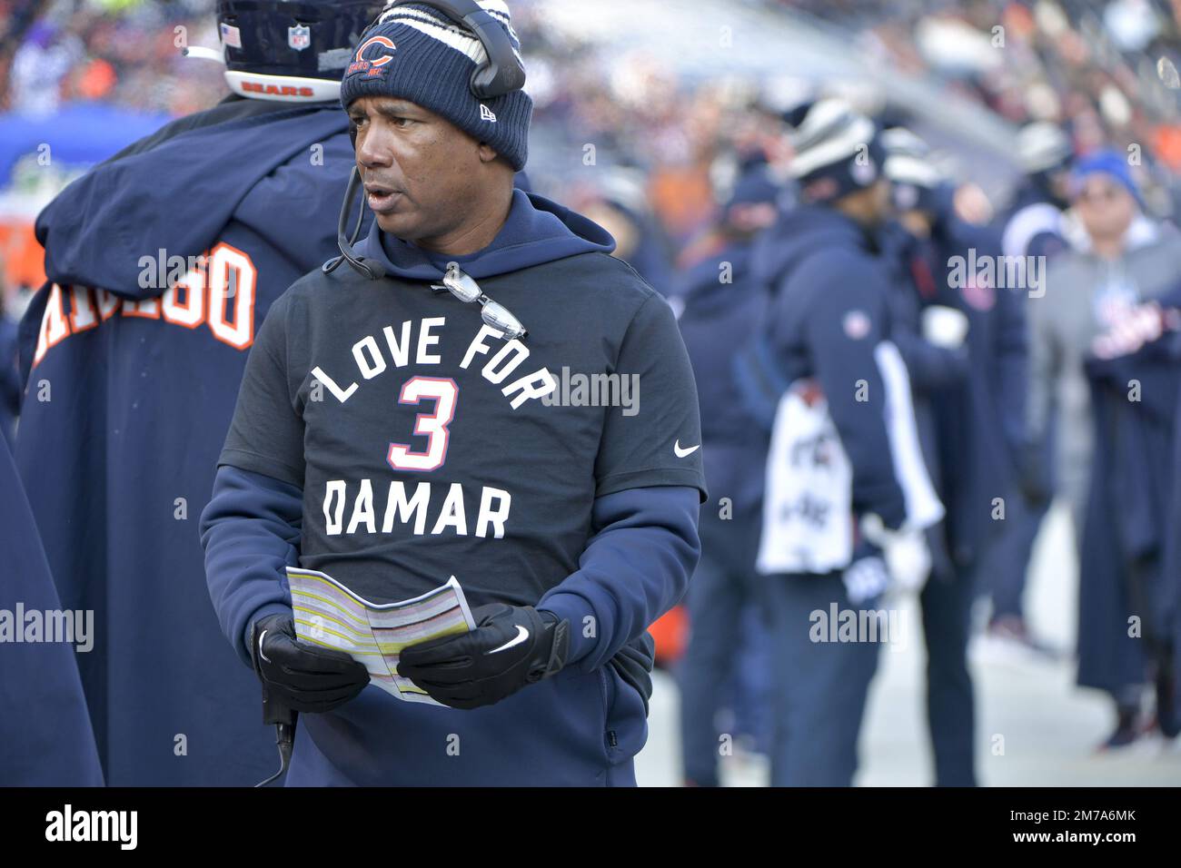 Chicago, United States. 08th Jan, 2023. A Chicago Bears coach wears a ...