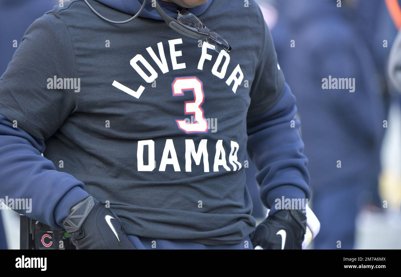 Chicago, United States. 08th Jan, 2023. A Chicago Bears coach wears a ...