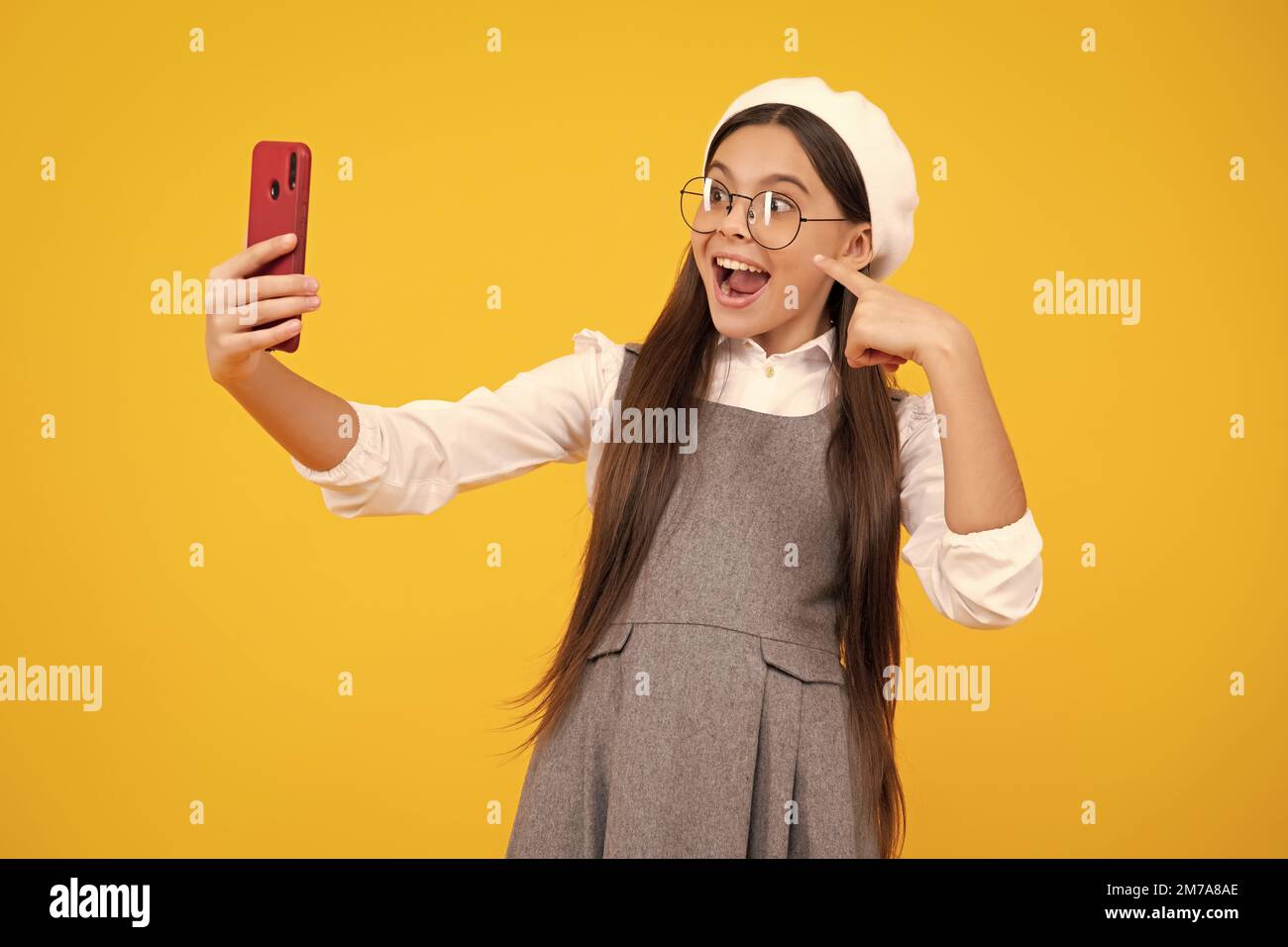 Kids selfie. Teenage girl with smart phone. Portrait of teen child ...