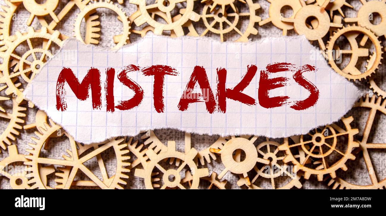MISTAKES word written on wood block, business concept Stock Photo - Alamy
