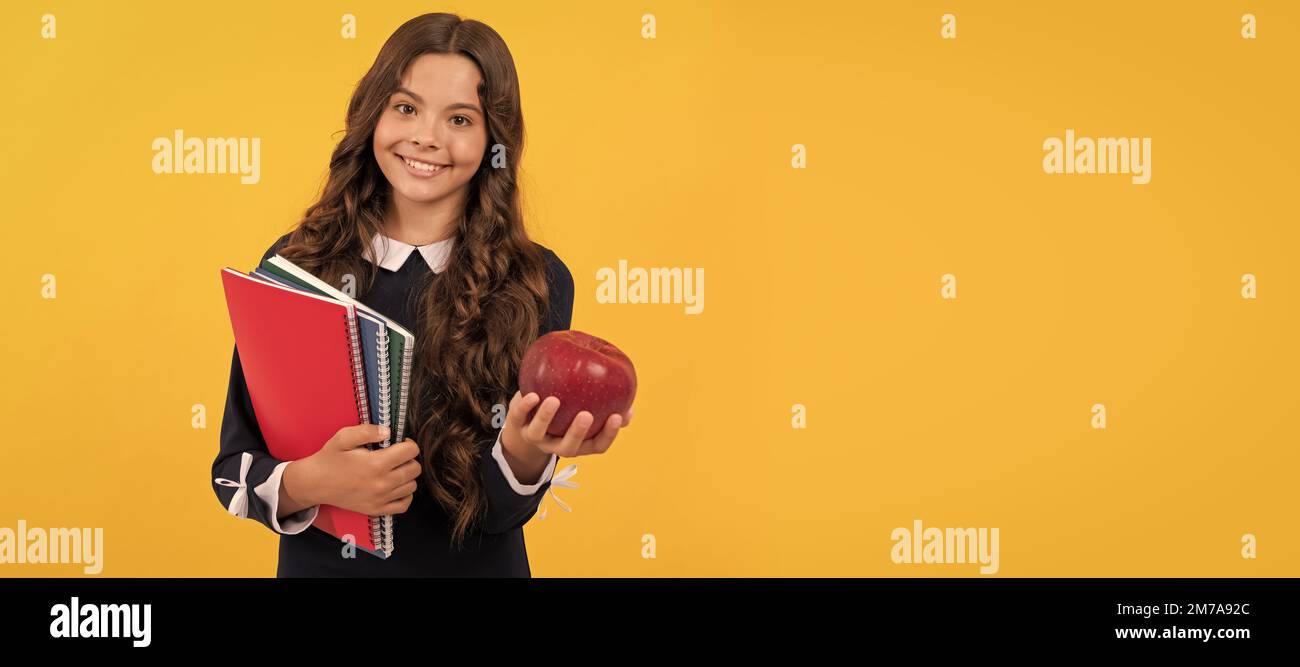 teen girl hold apple after study. healthy childhood. happy kid going to ...
