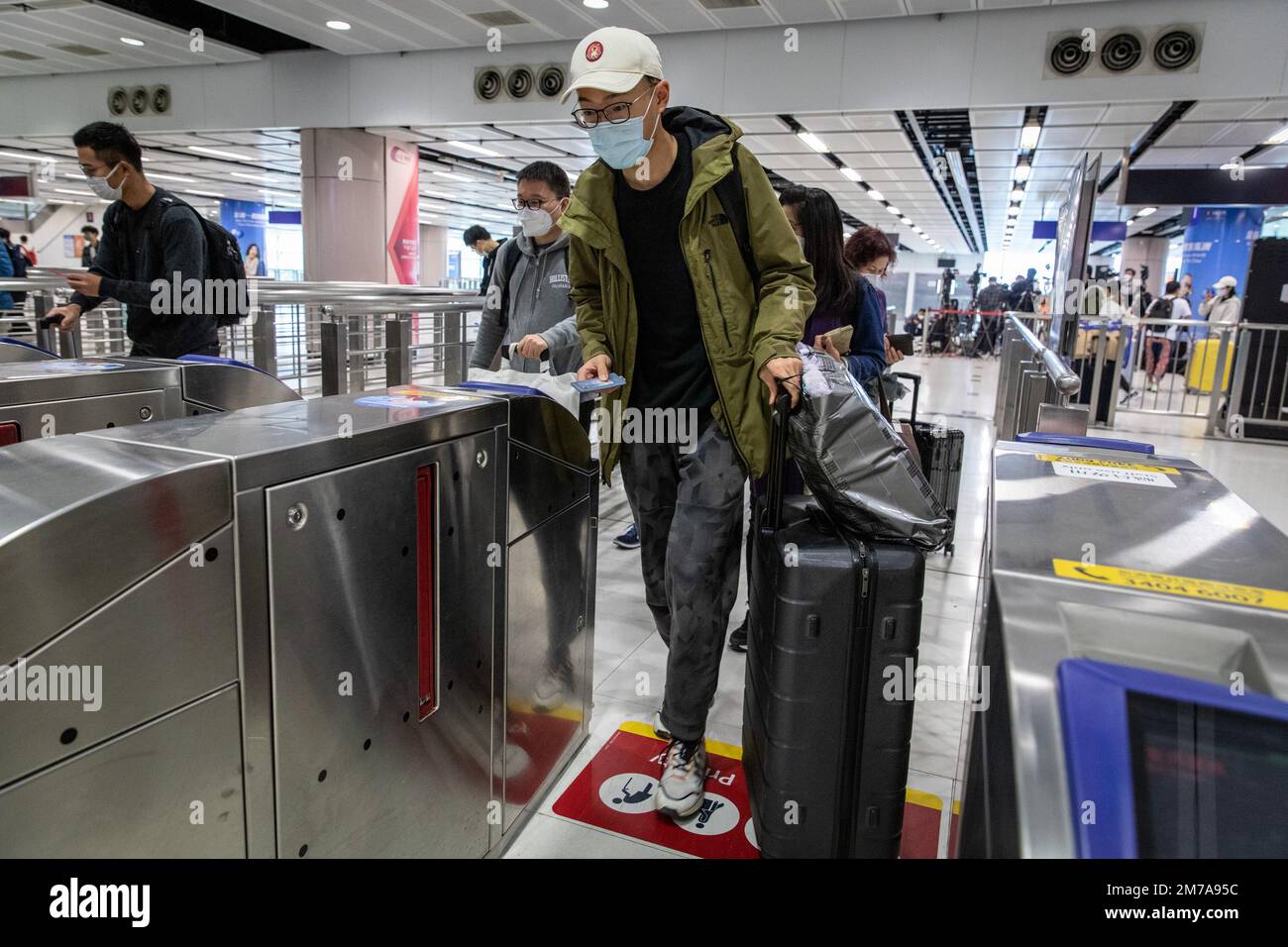 People depart for Shenzhen, China from Hong Kong at the Lok Ma Chau ...