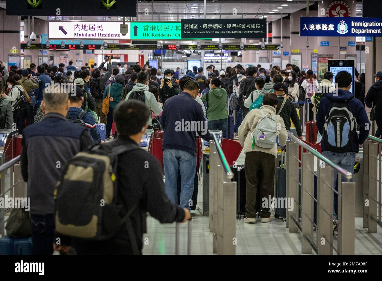 Cross-boundary passengers flocked at the border control area after the ...