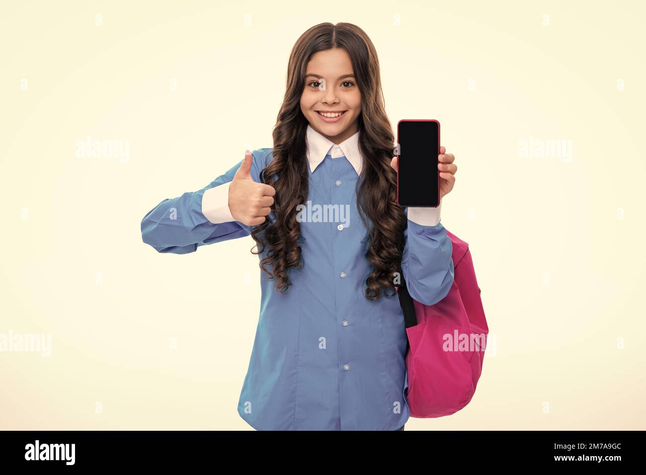 School kids using mobile phone hi-res stock photography and images - Alamy