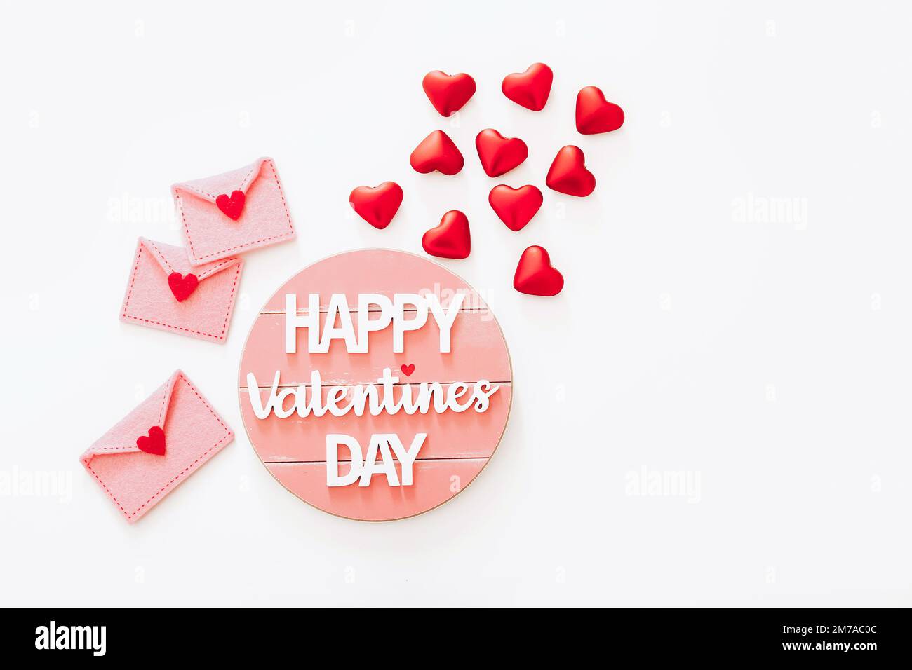 Wooden Happy Valentine's Day message with felt envelopes and red hearts ...