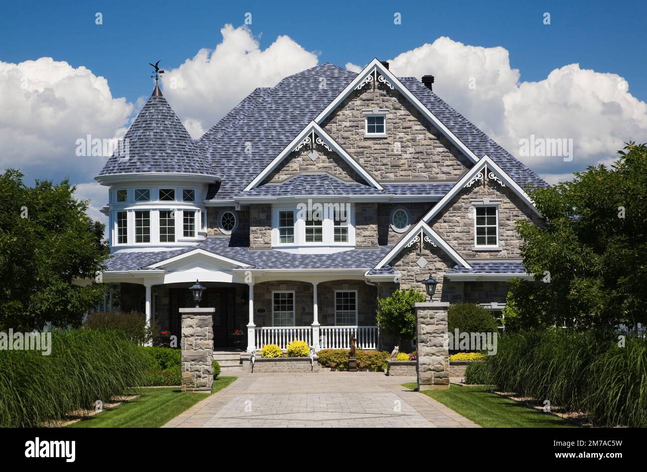 Elegant modern grey stone with white trim and blue roof Victorian style ...