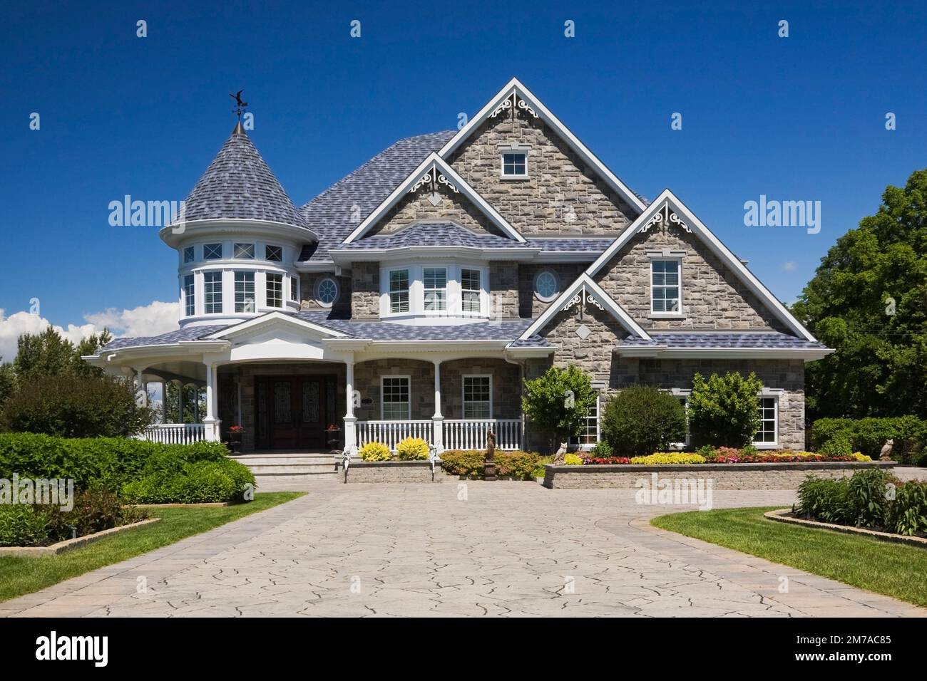 Elegant modern grey stone with white trim and blue roof Victorian style ...