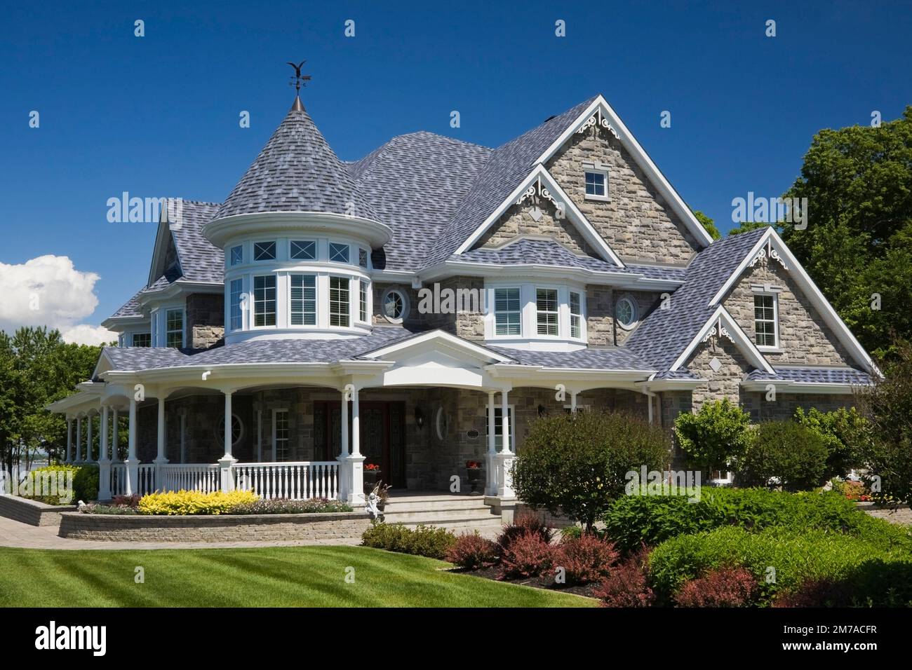 Elegant modern grey stone with white trim and blue roof Victorian style ...