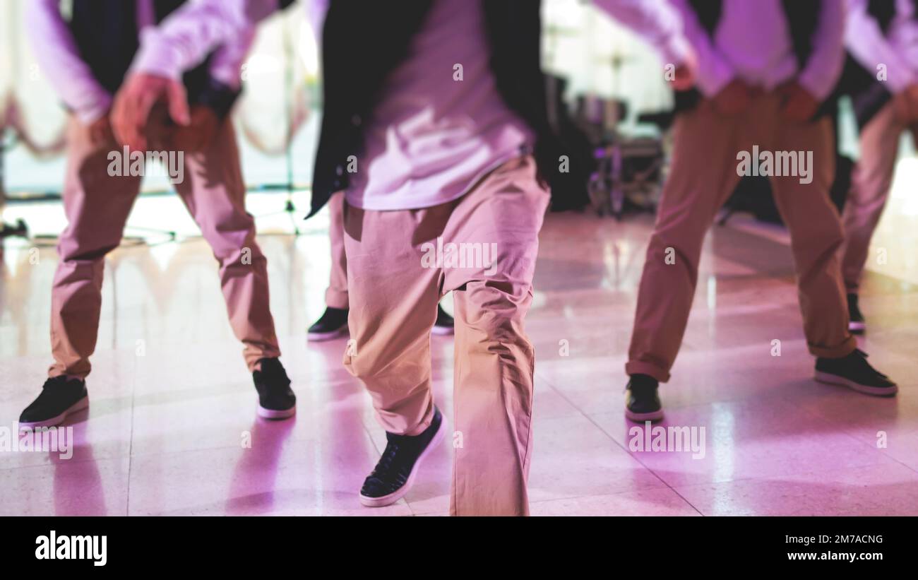 Group of hip-hop dancers performance on a stage, modern contemporary ...