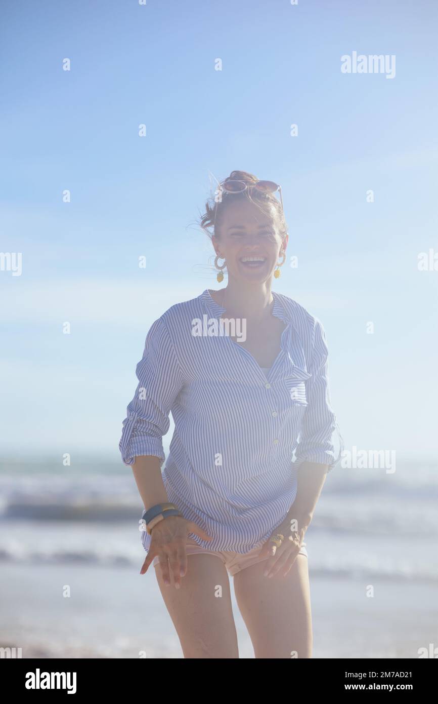happy stylish middle aged woman at the beach having fun time Stock ...